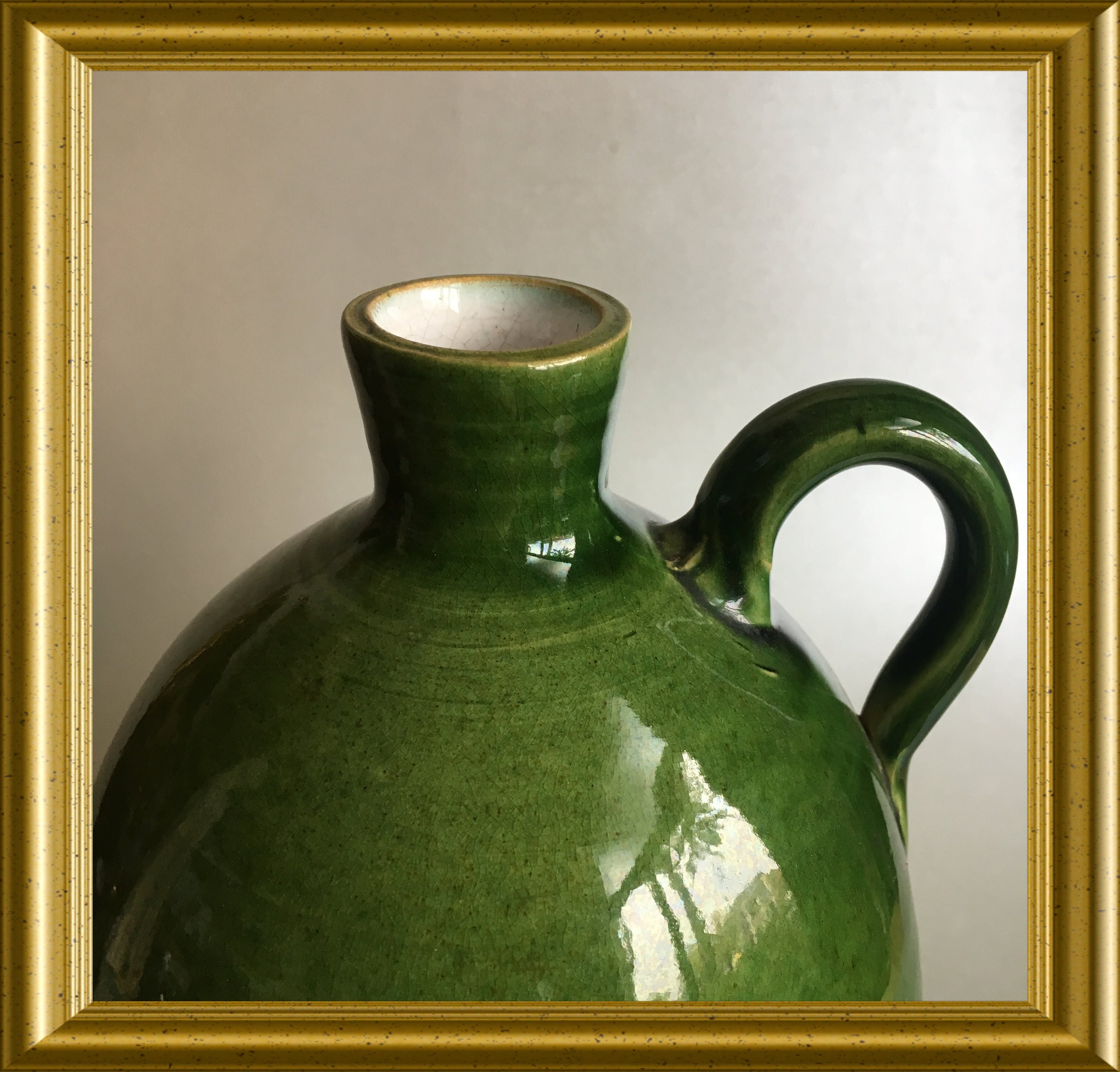Vintage green earthenware jug