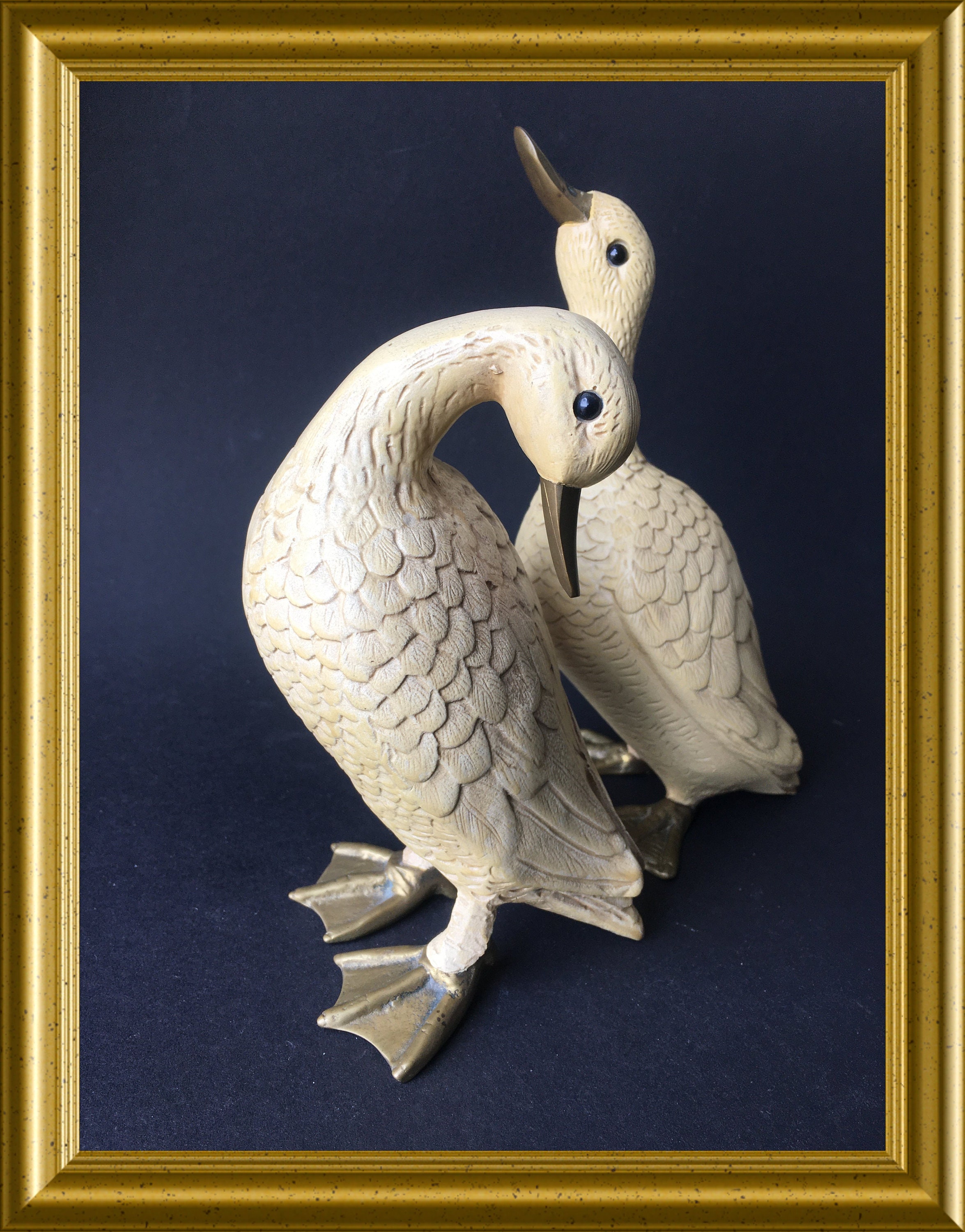 Two signed statues, ducks: Elli Malevolti