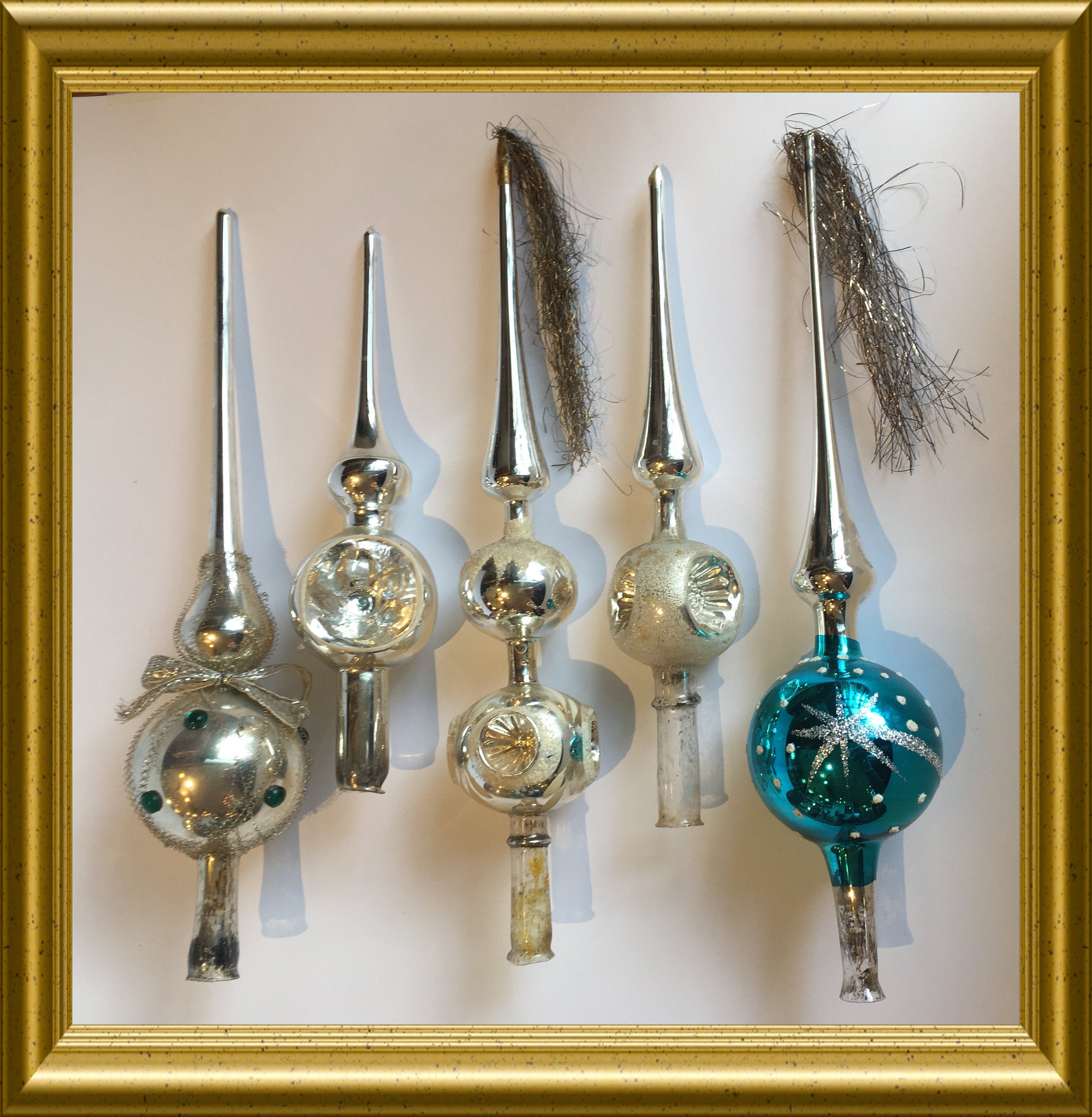 Vintage blue glass tree topper with a star, celestial tree topper