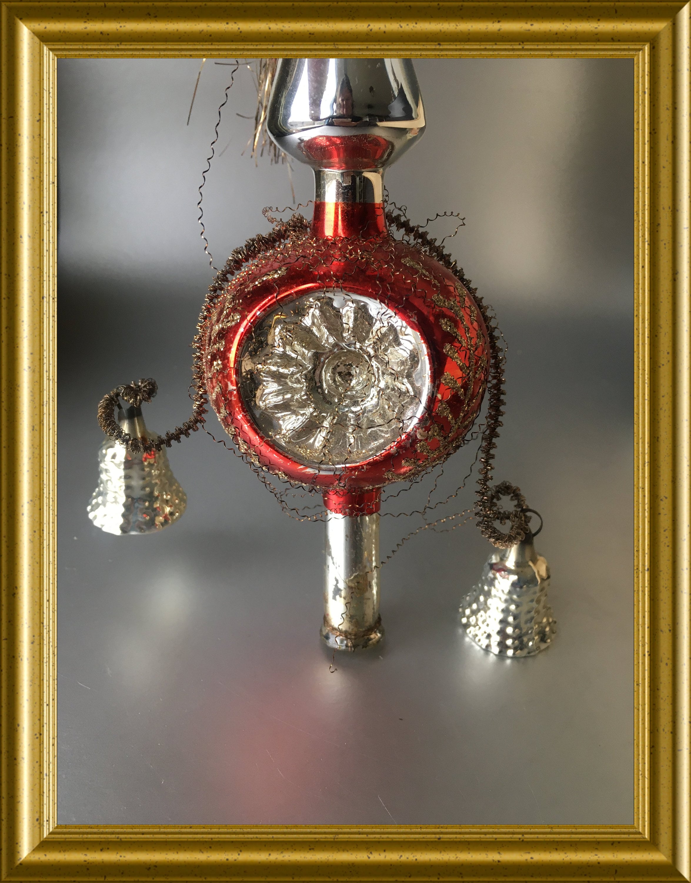 Vintage glass tree topper with dent and bells