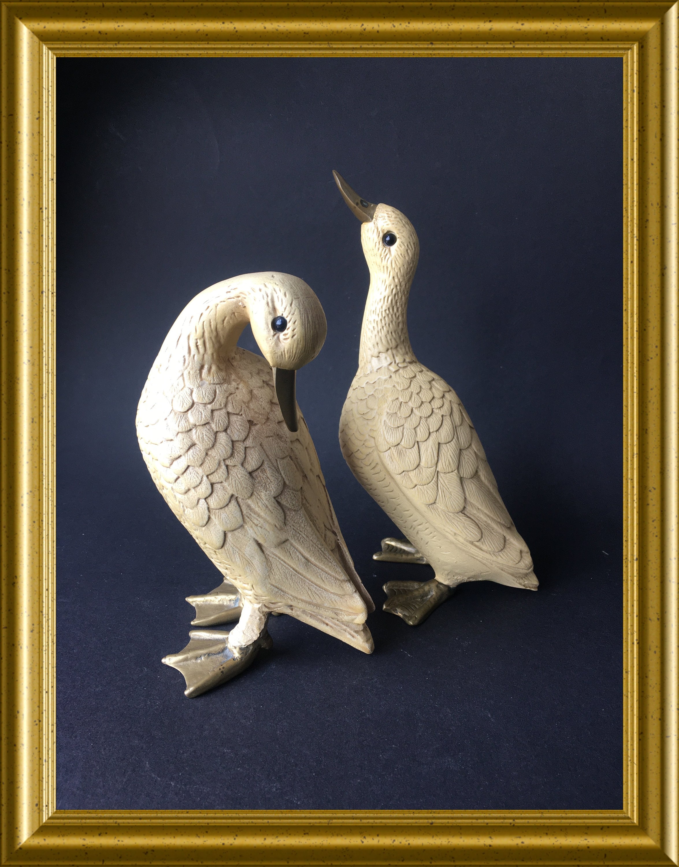 Two signed statues, ducks: Elli Malevolti