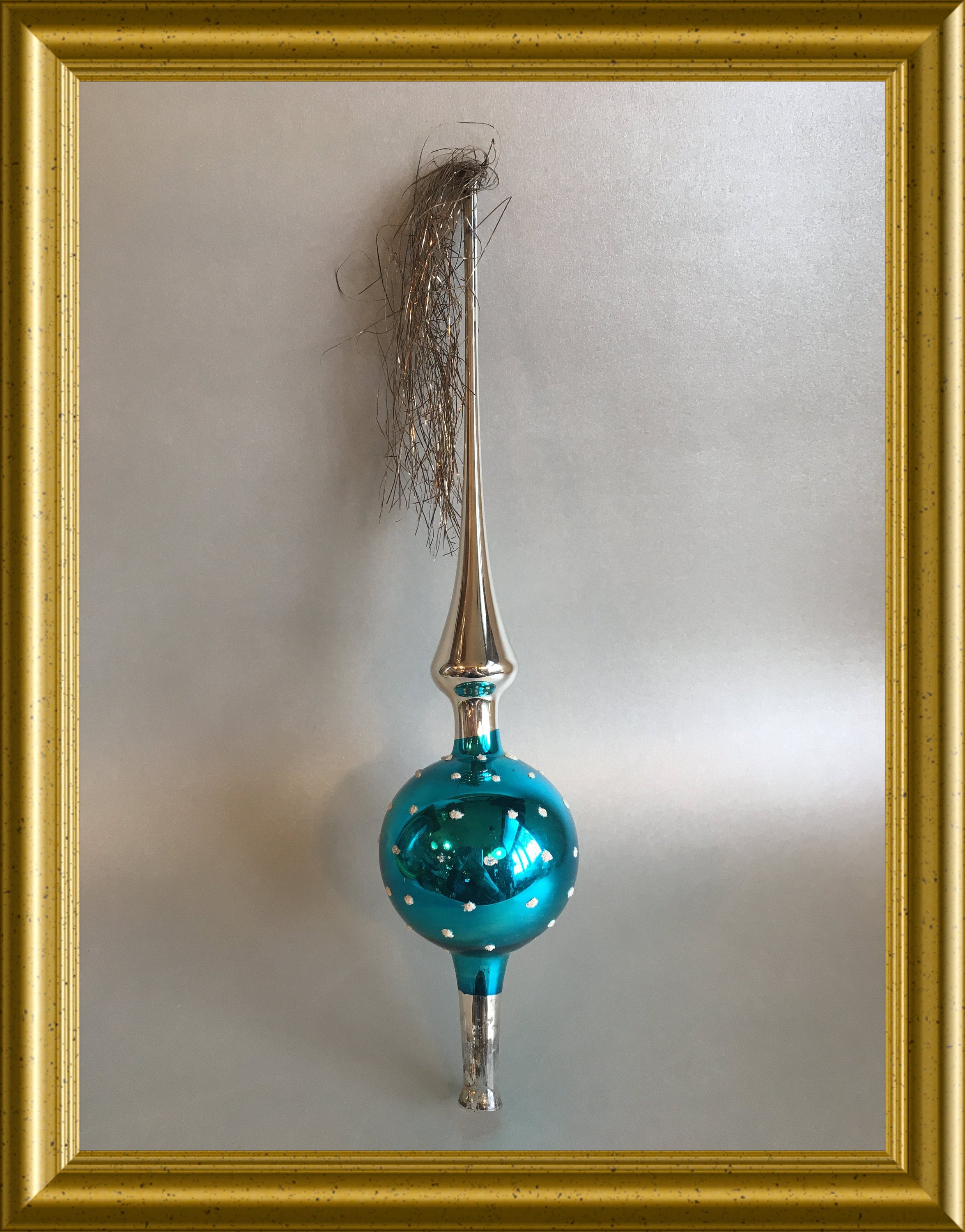 Vintage blue glass tree topper with a star, celestial tree topper