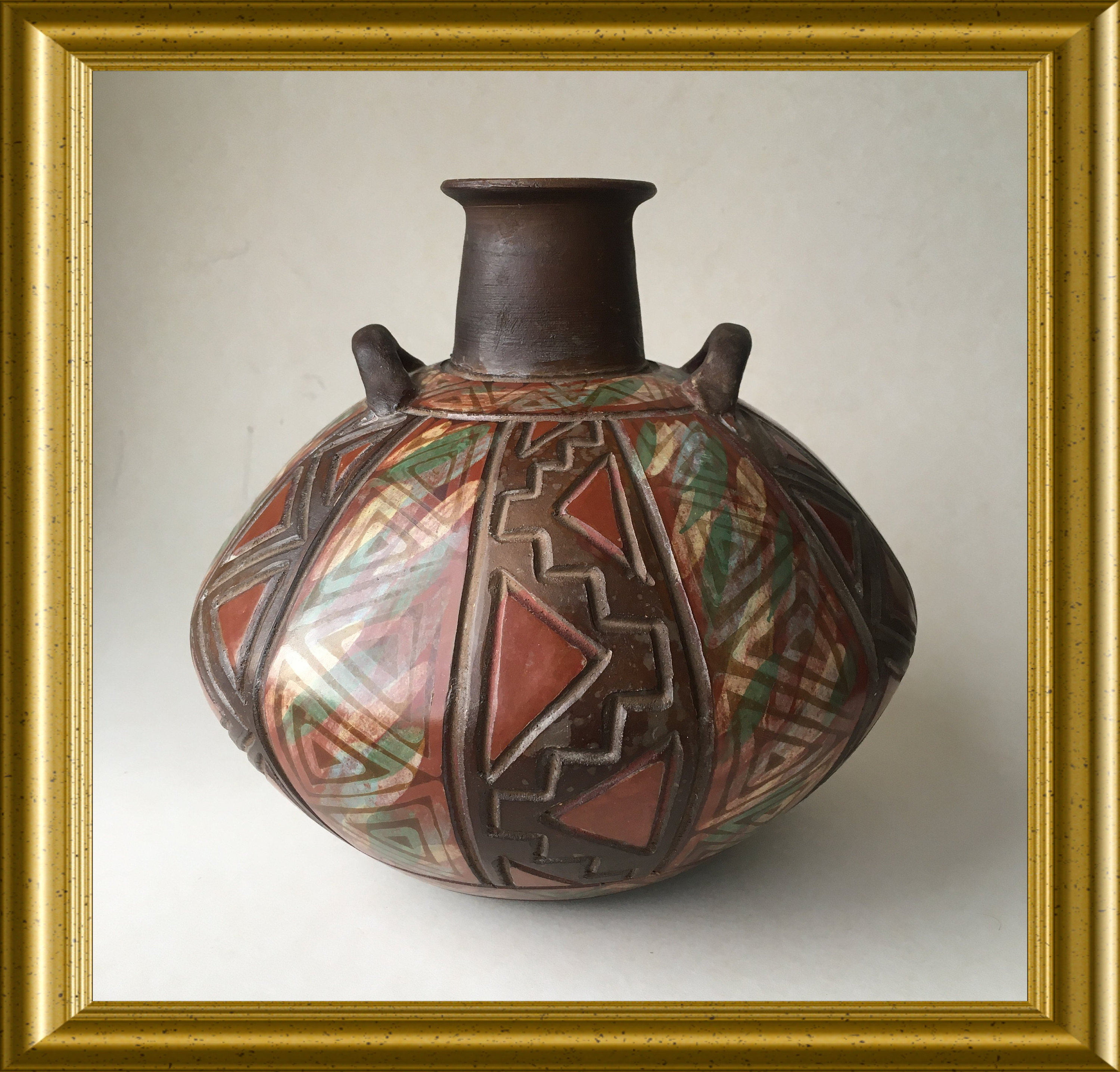 Signed Inca pottery vase: Santodio Paz, Chulucanas, Peru, geometric design