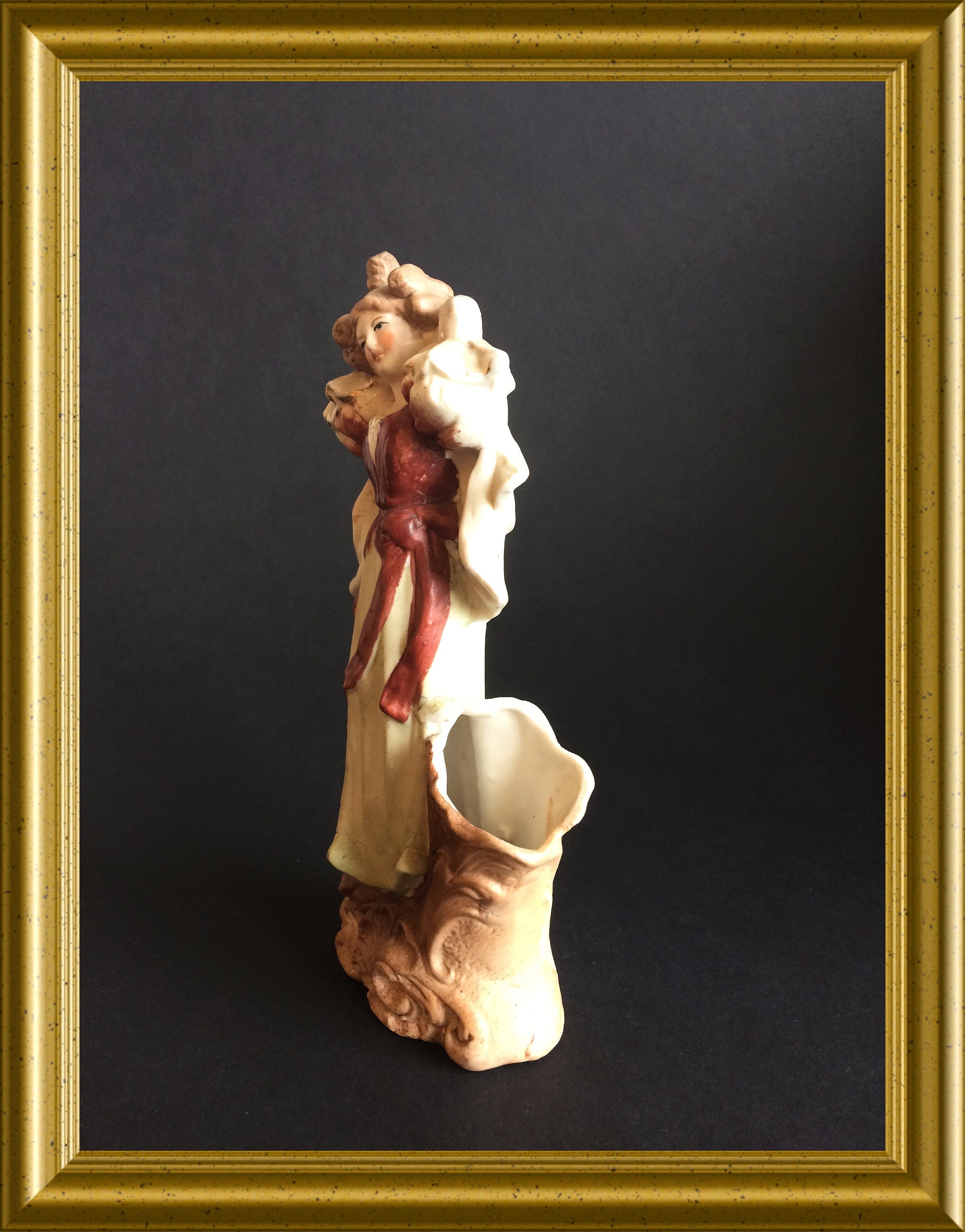 Antique bisque porcelain figurine