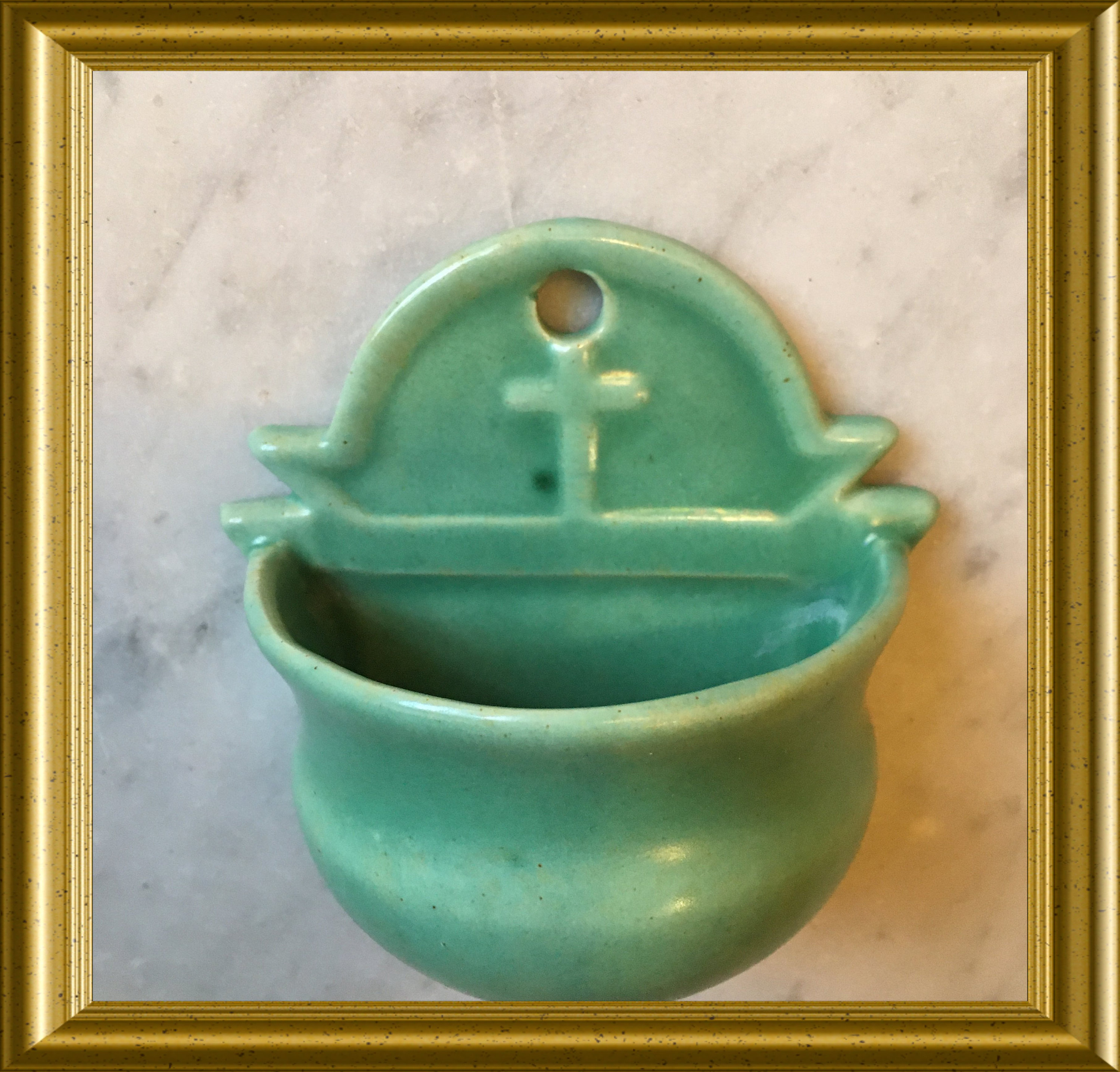 Vintage green ceramic holy water font: cross