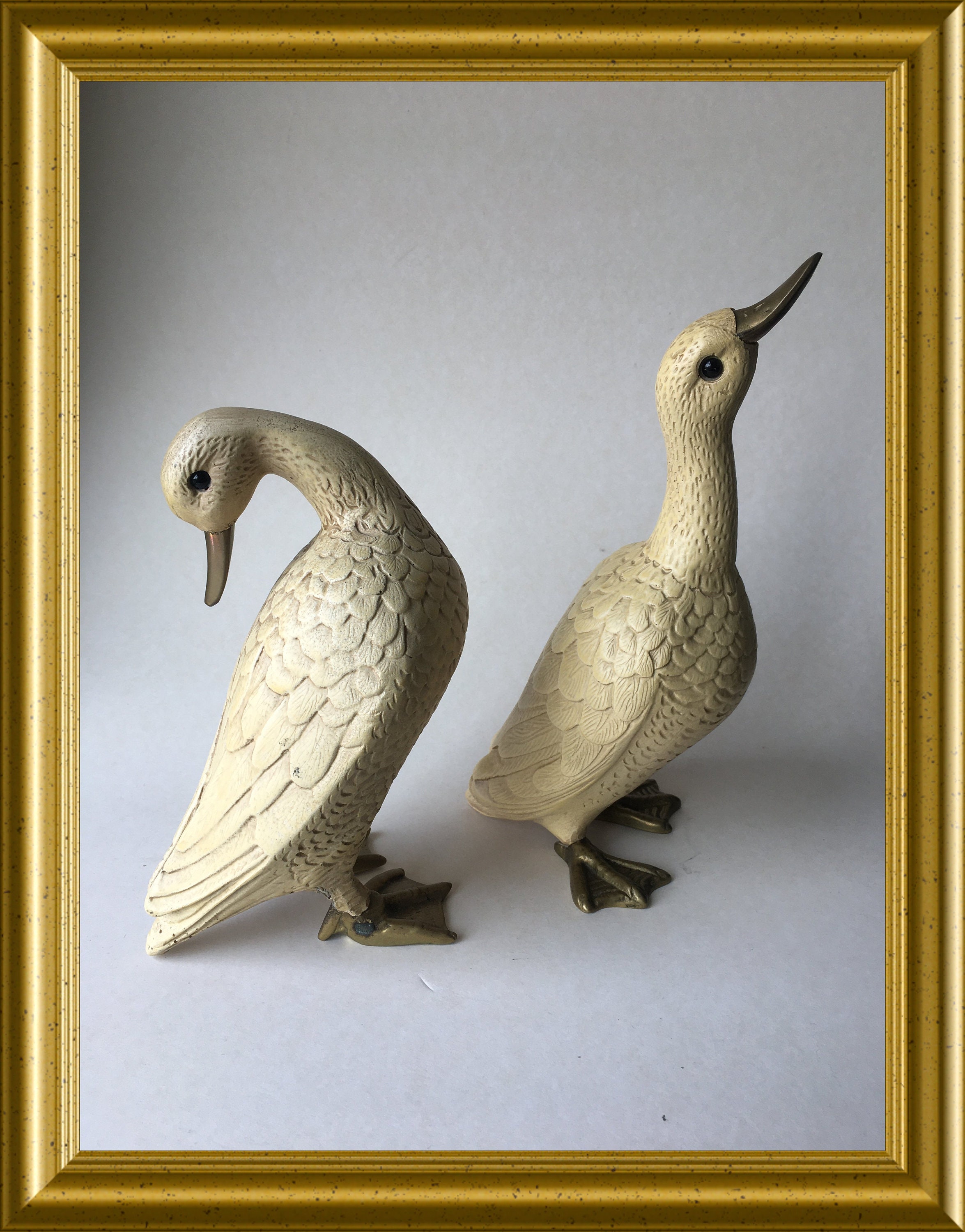 Two signed statues, ducks: Elli Malevolti