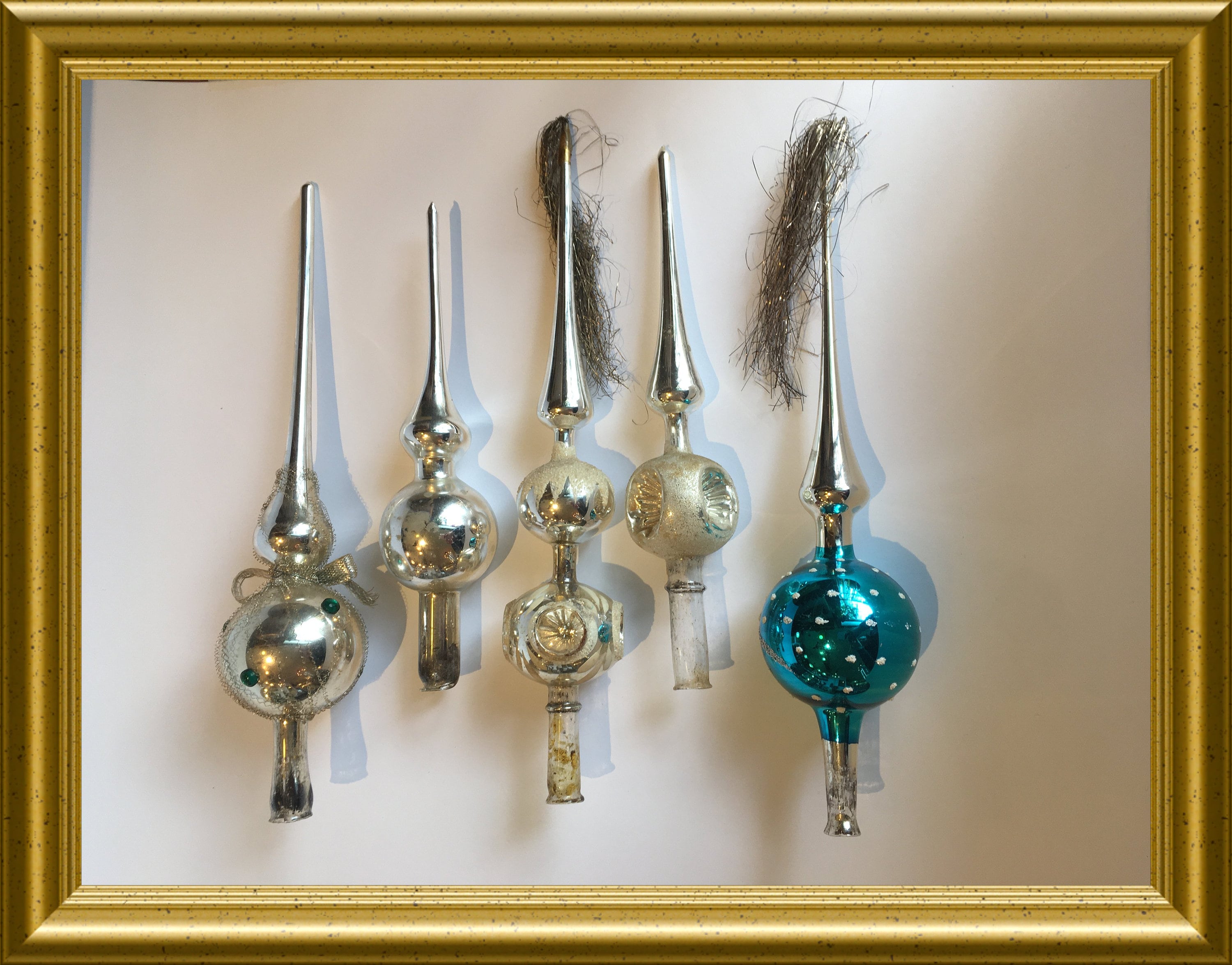 Vintage blue glass tree topper with a star, celestial tree topper