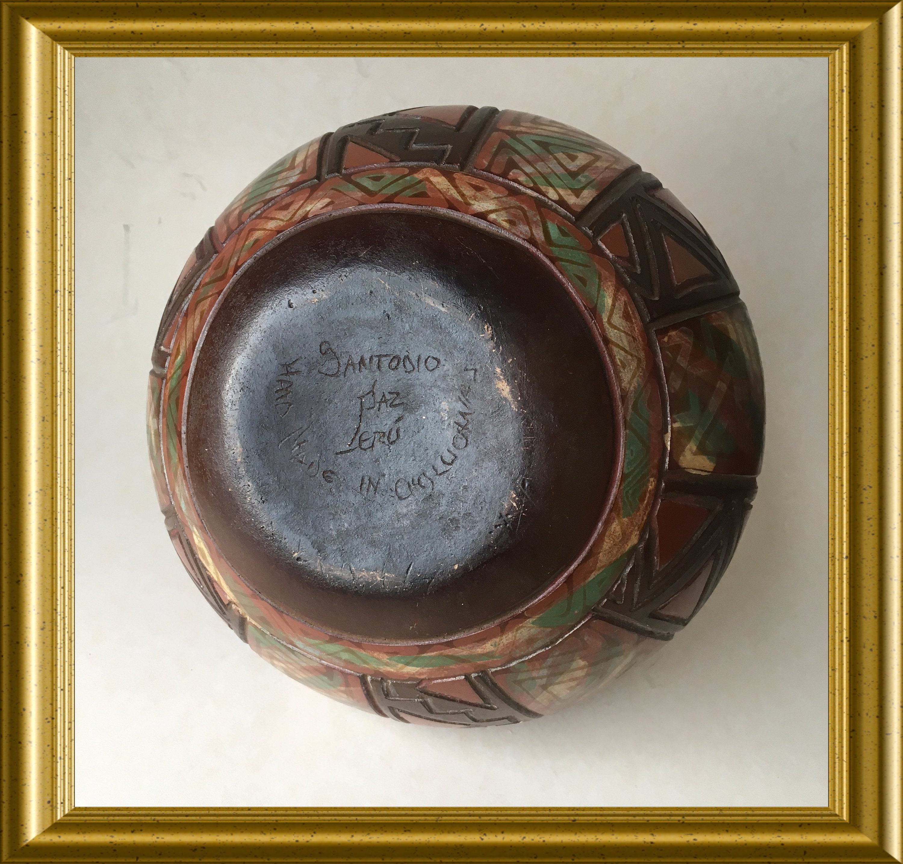 Signed Inca pottery vase: Santodio Paz, Chulucanas, Peru, geometric design