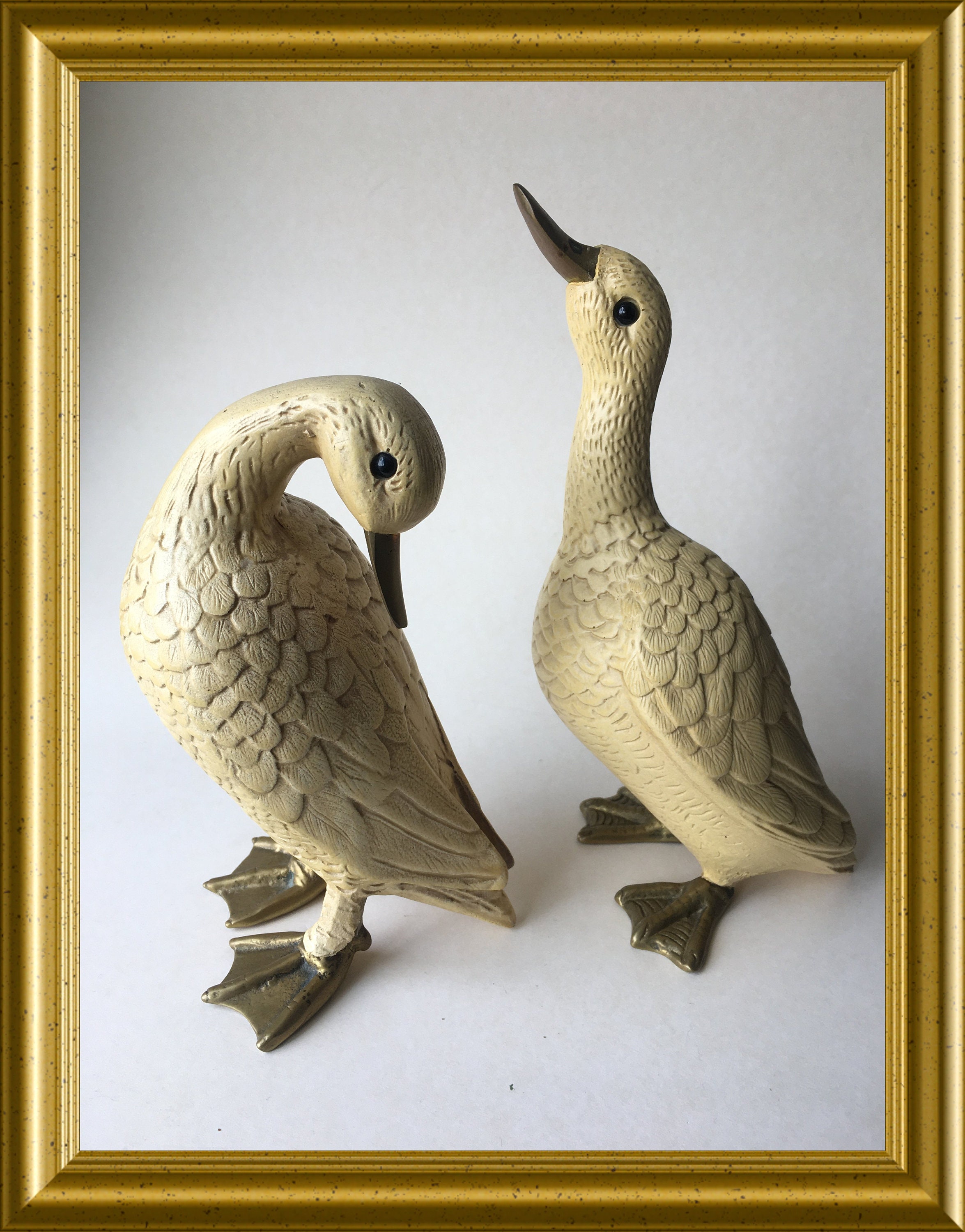 Two signed statues, ducks: Elli Malevolti