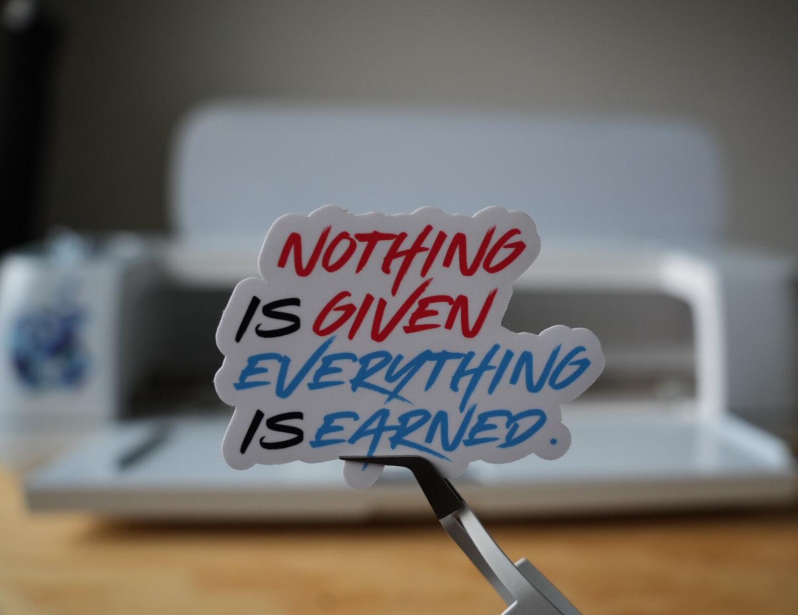 Motivational Sticker - 'nothing is Given, Everything is Earned ...