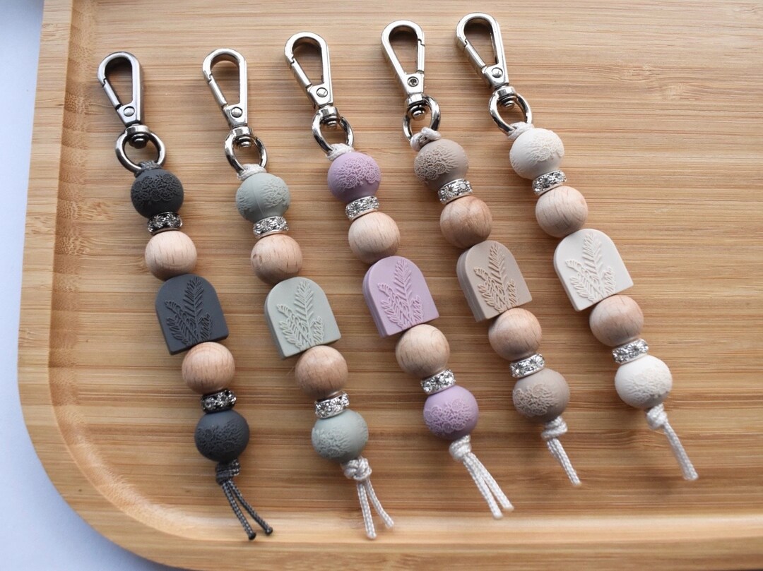 Floral Embossed Arch Keychain | Beaded Key Chain | Backpack Zipper Pull ...