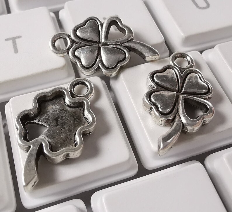 35 Pcs Antiqued Silver Four Leaf Clover Charms 11x20 Mm Metal - Etsy