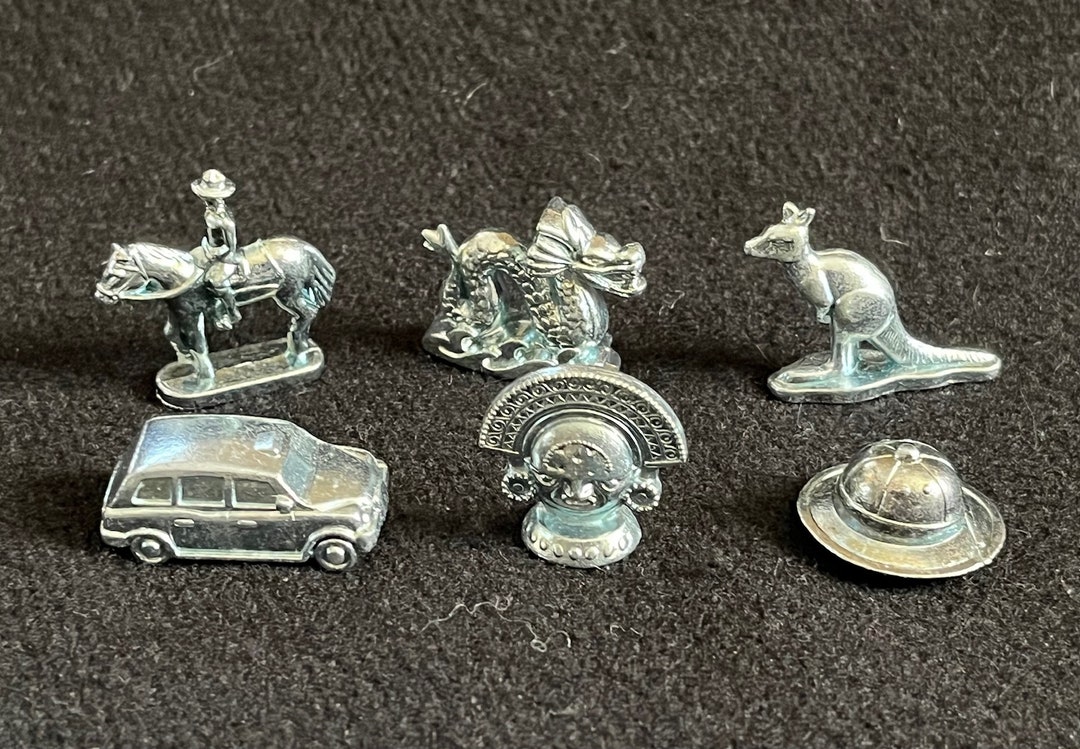 Six Large Tokens From an Explorer-themed Monopoly Gamepith Helmet ...