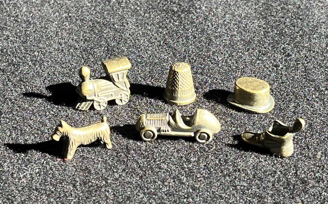 6 Bronze-toned Monopoly Tokens -- Locomotive, Thimble, Top Hat, Dog ...