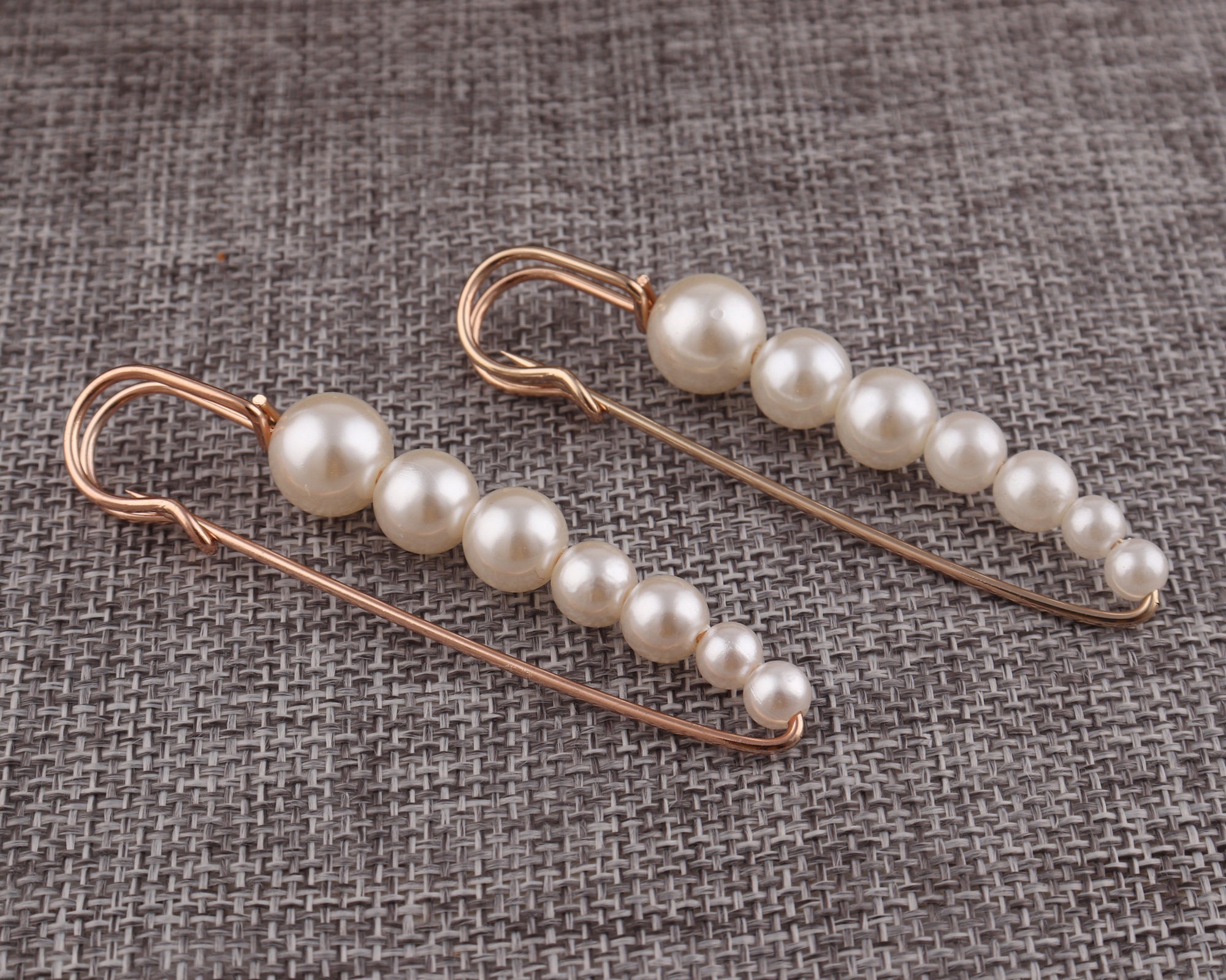 Pearl safety pin store