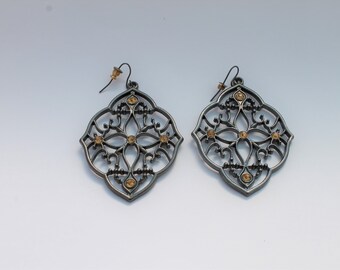 Metal flower earring | Etsy