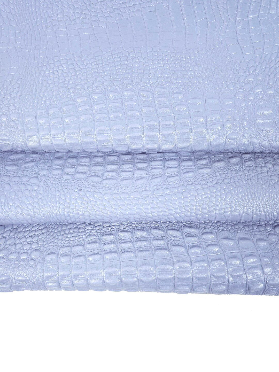 Couro de jacaré de crocodilo azul halogênio com textura em relevo ...