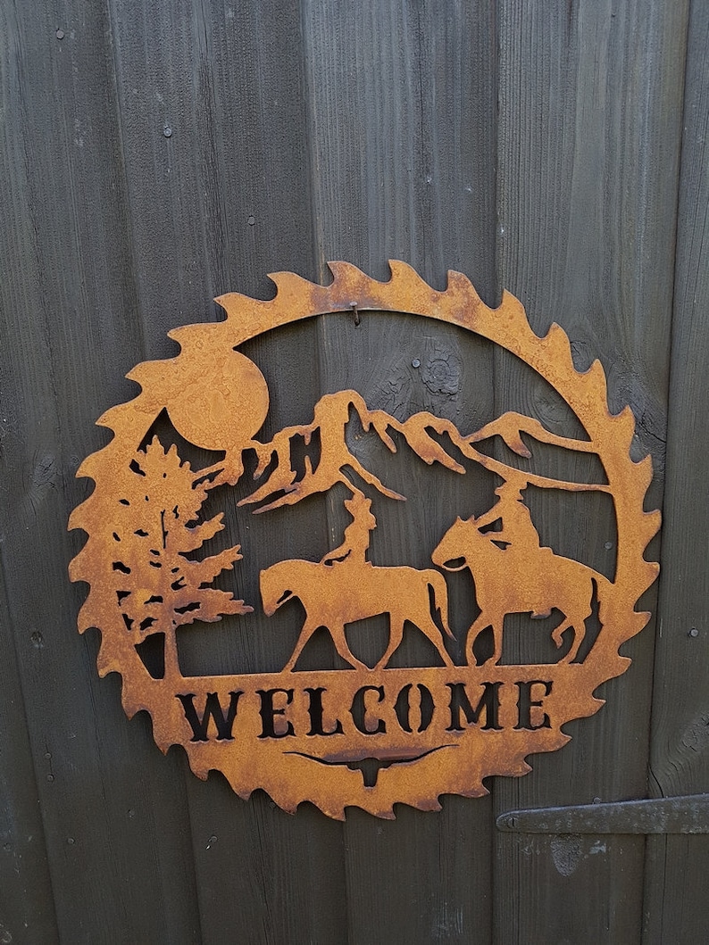Rusty Metal Welcome Sign Cowboy Horseback Riders in Sawblade Design ...