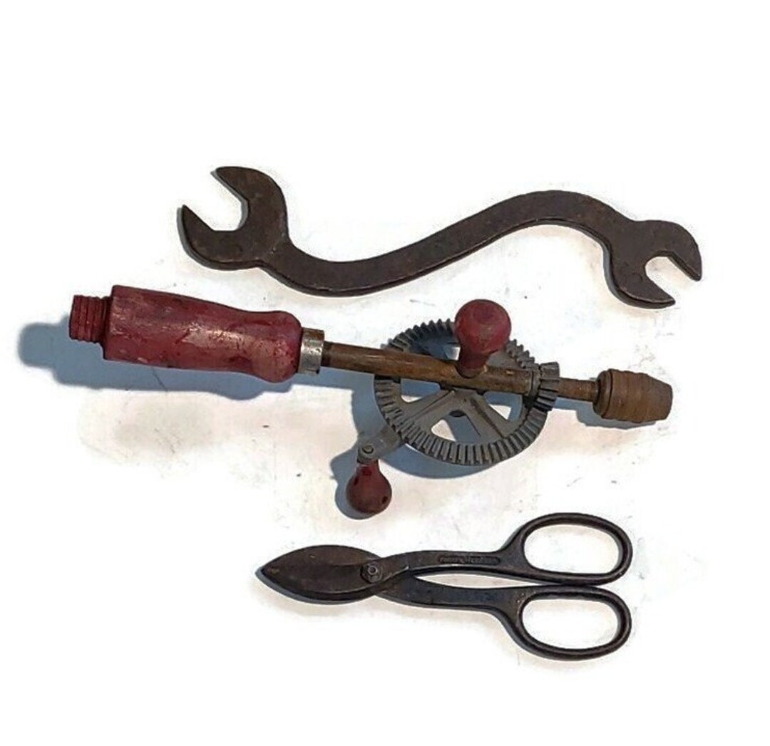 Collection of Three Vintage Rusty Tools Including Drill, Wrench, and ...