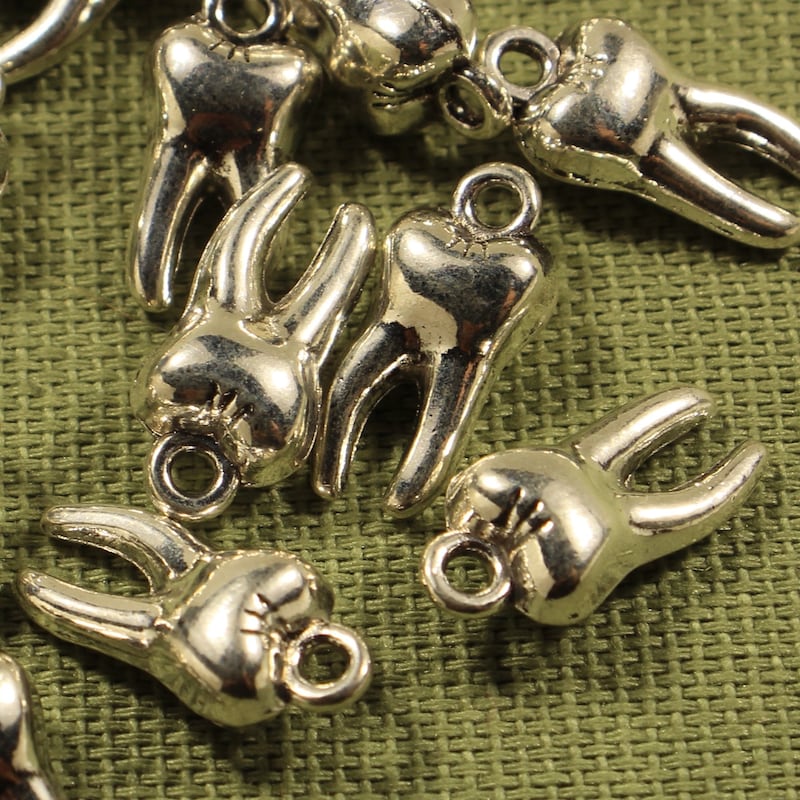 Silver Tooth - Etsy