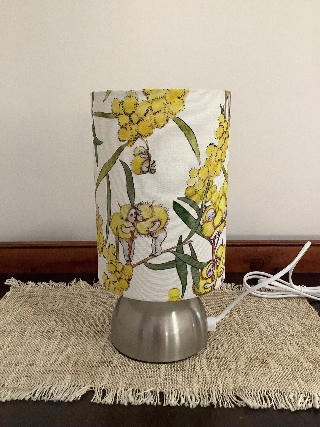 May Gibbs, Snugglepot and Cuddle Pie Touch Lamp, Yellow Wattle on a ...