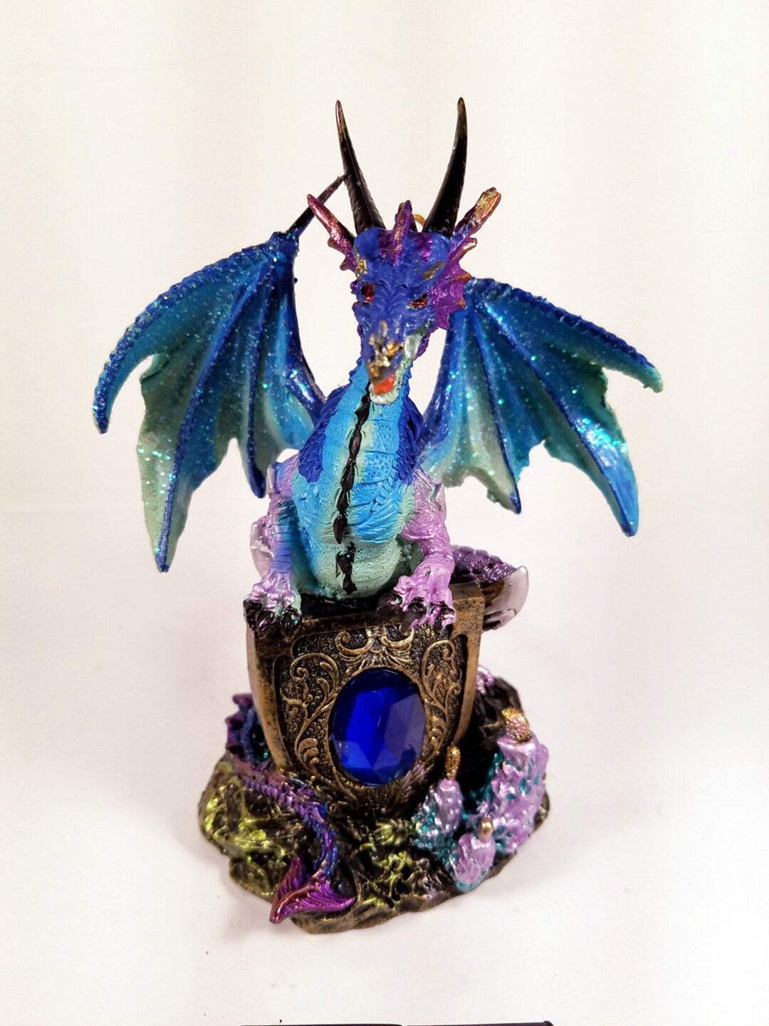 Blue Dragon Holding Shield With Gem on a Rock Collectible Figurine ...