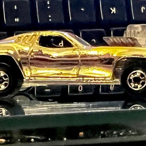 Hot Wheels Rodger Dodger Chrome Gold Plum Purple Charger. Black Wall ...