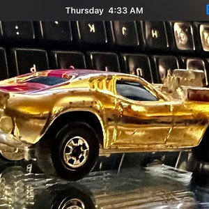 Hot Wheels Rodger Dodger Chrome Gold Plum Purple Charger. Black Wall ...