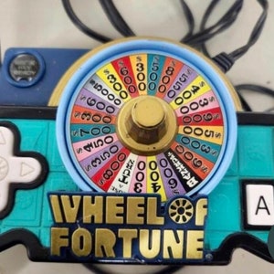 Wheel of Fortune Game. the Wheel of Fortune TV Control. Electronic ...