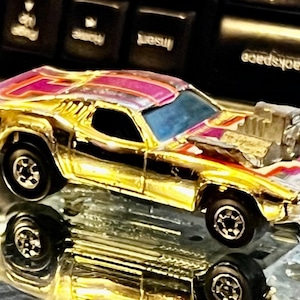 Hot Wheels Rodger Dodger Chrome Gold Plum Purple Charger. Black Wall ...