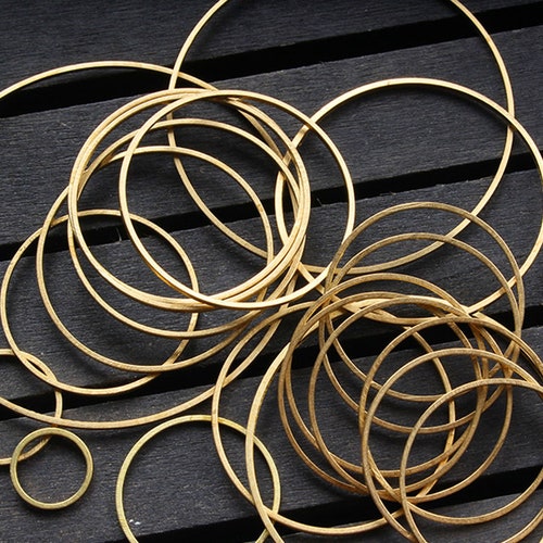 100pcs Raw Brass Hollow Round Pendant Charms Raw Brass - Etsy