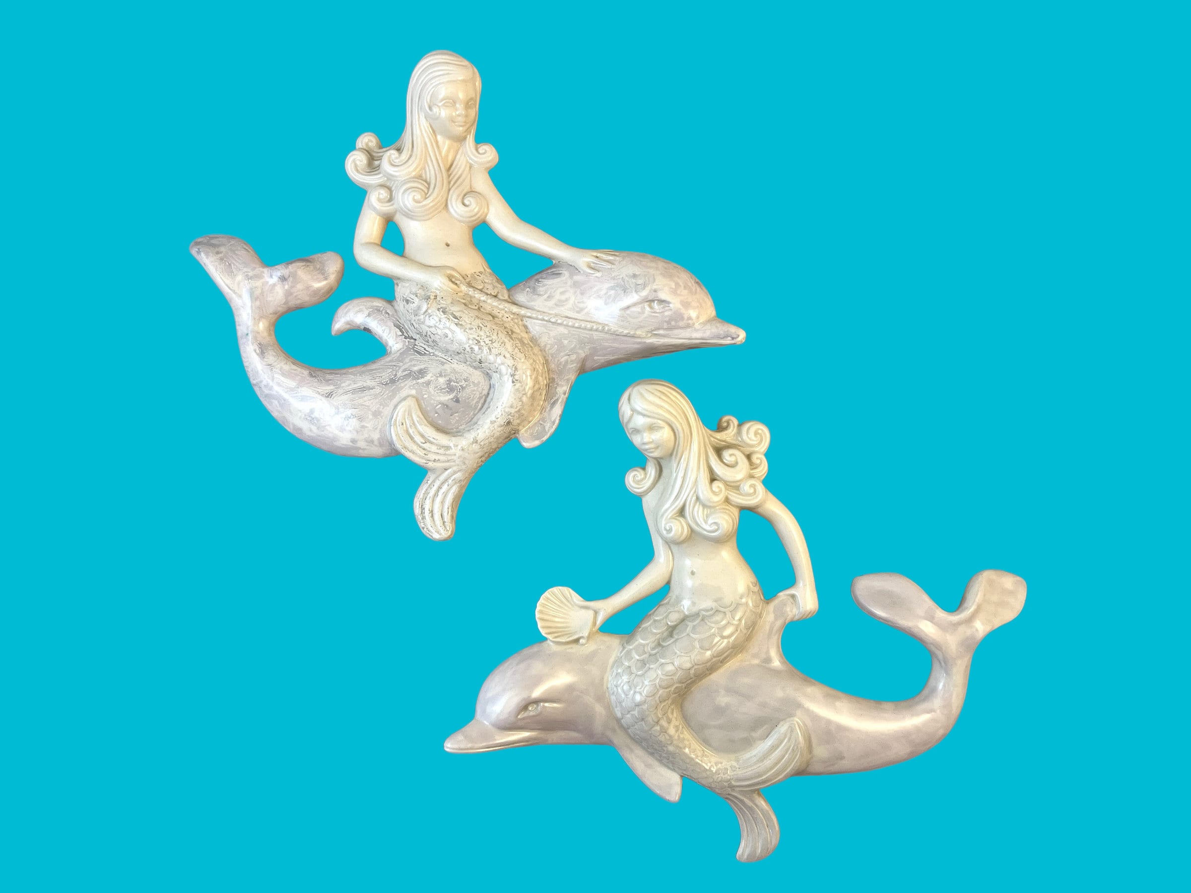 Mermaids And Dolphins