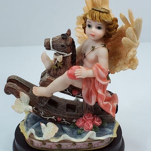 Turtle King Corp "de Elina" Angel on Rocking Horse, China - Etsy