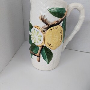 White Ceramic Lemon Pitcher With Colourful Lemons Embossed White Twirl ...