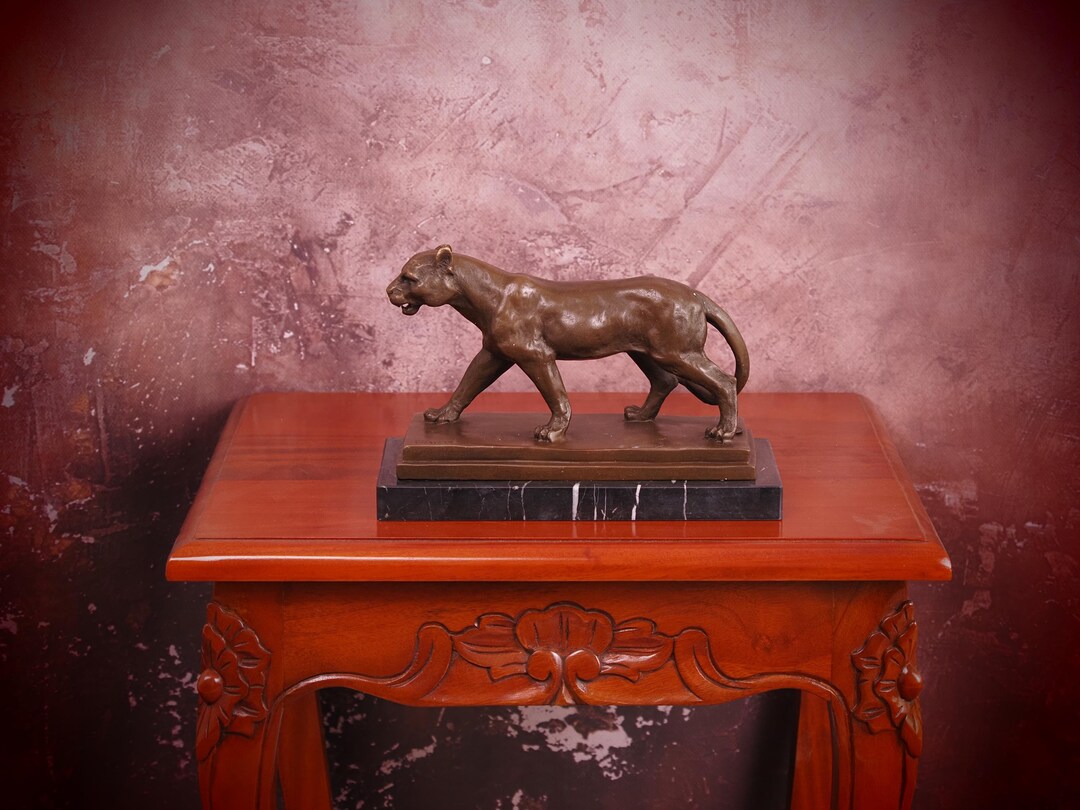 Majestic Bronze Lioness Figurine: A Timeless Blend of Strength and ...