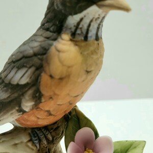 Vintage Andrea by Sadek Robin Perched on a Stump With Pink Flowers ...