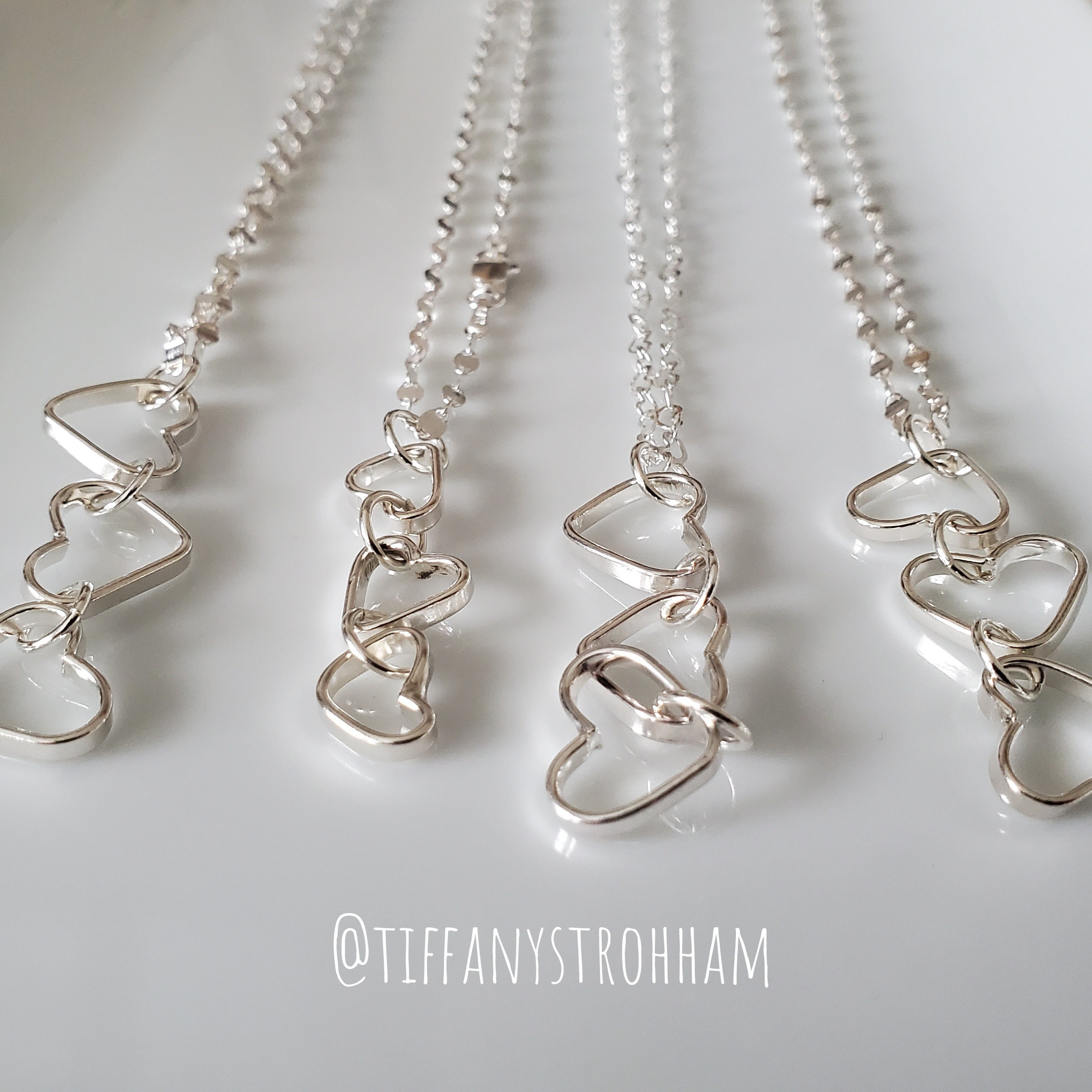 Heart connected necklace store