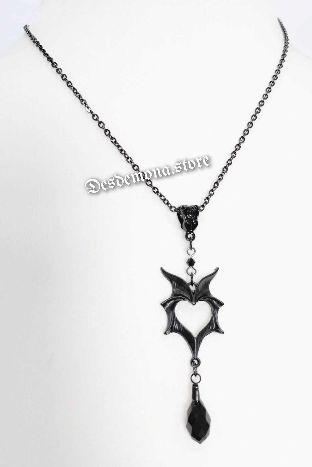 Black Heart Shaped Dragon Bat Wings Red Black Green Purple Faceted ...
