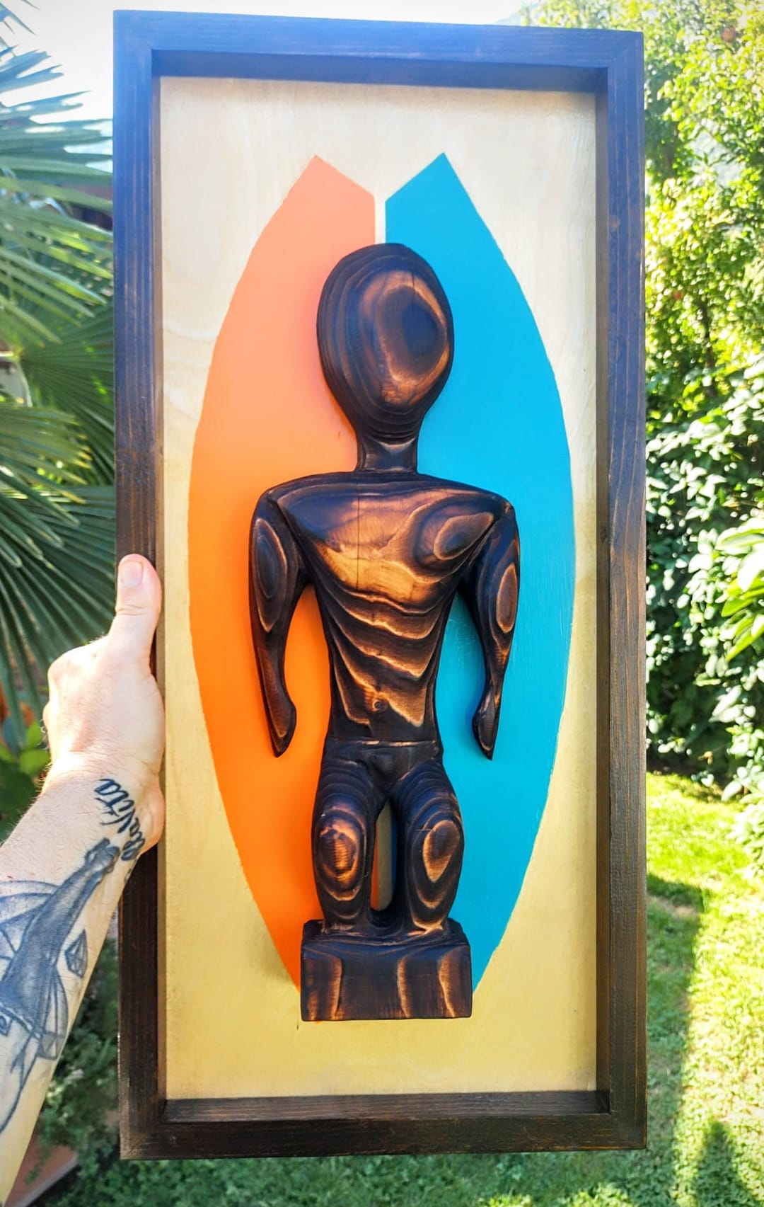 Tiki Nukuoro in Mid Century Modern Frame. Background on Birch Wood in ...