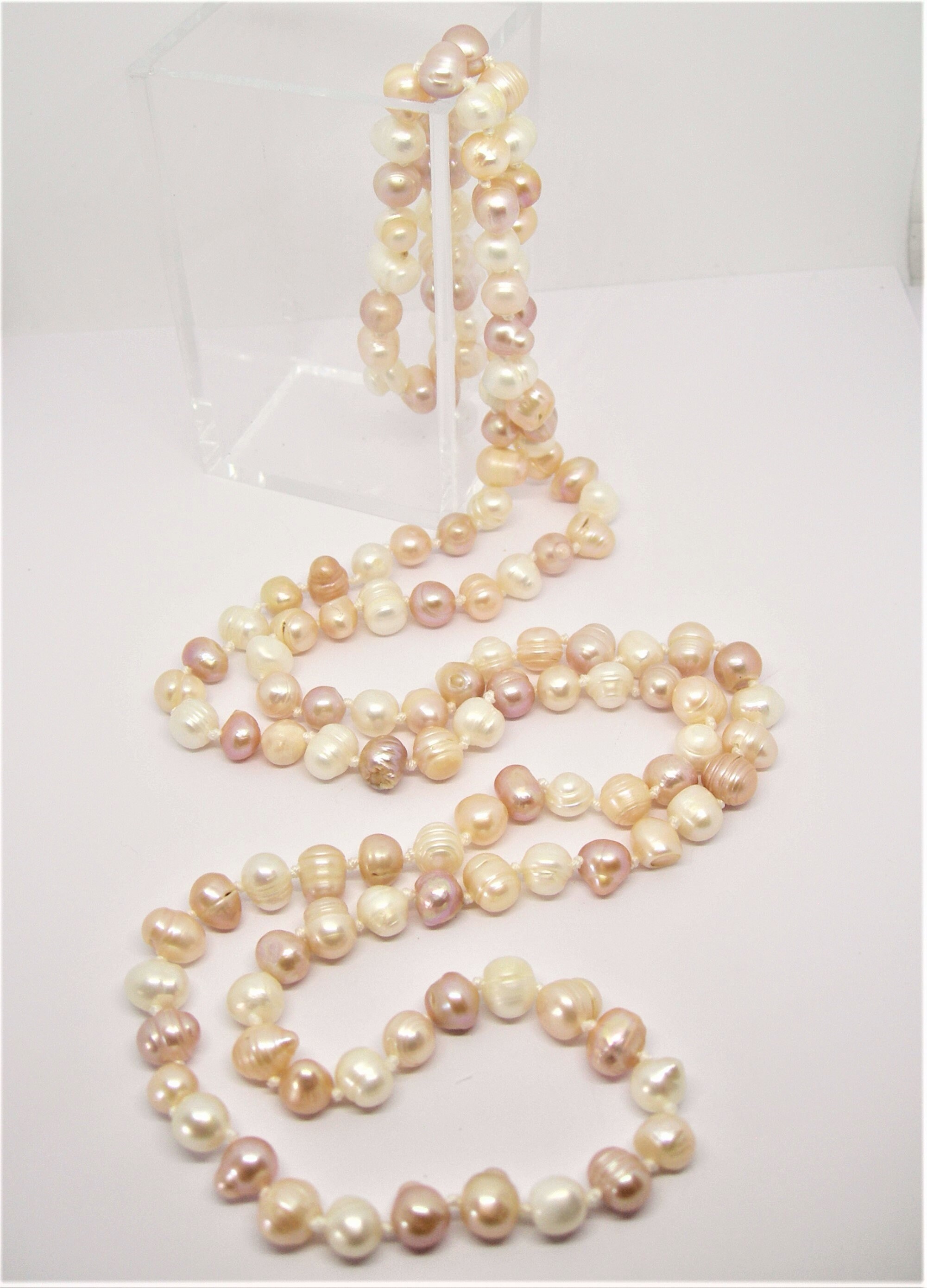 Freshwater pearls large knotted necklace peach colour | Etsy