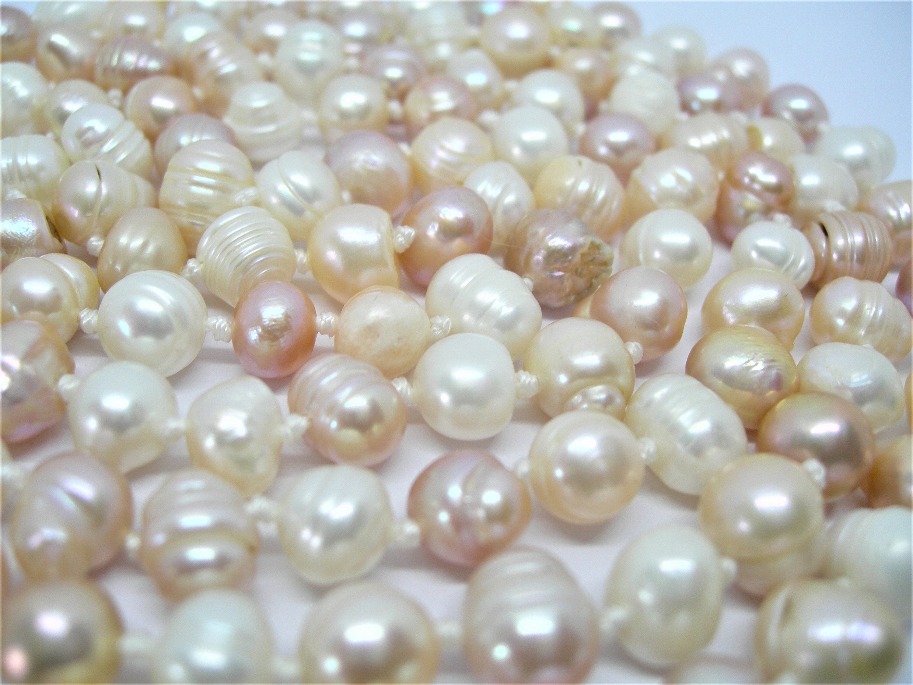 Freshwater pearls large knotted necklace peach colour | Etsy