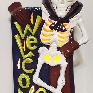 Skeleton Welcome Sign With Lights. Offering a Cute Halloween Welcome ...