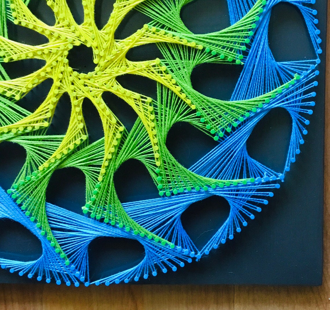 Homemade string art Pinwheel inspired | Etsy