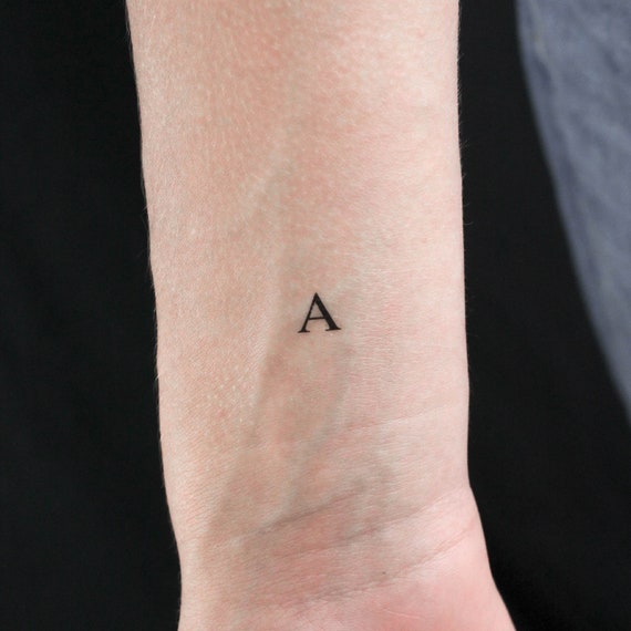 Alpha symbol tattoo - Bronctattooaus.com
