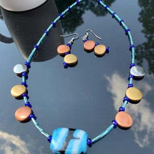 Blue and Metallic Bead Bead Set With Central Blue Bead - Etsy