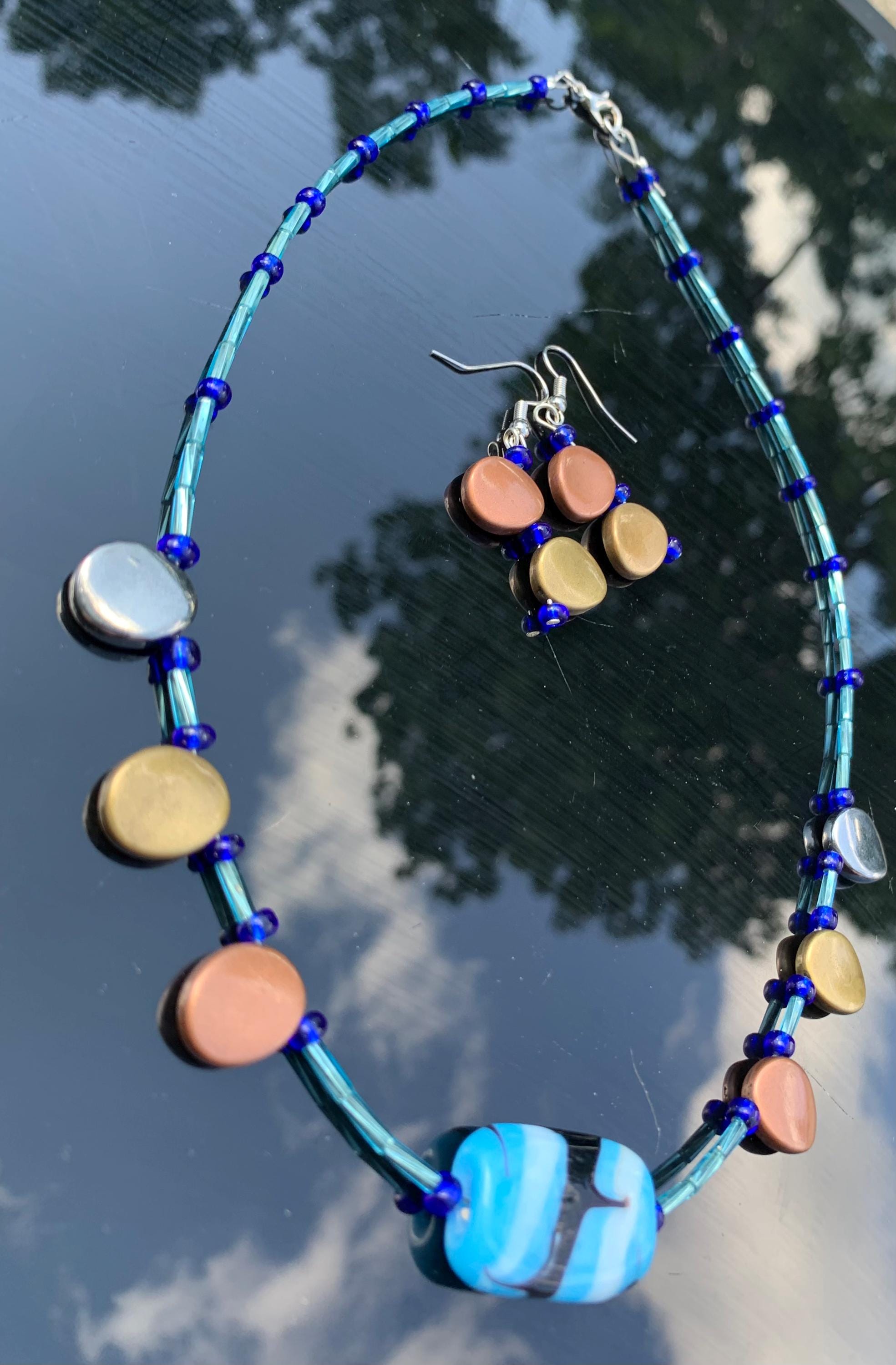 Blue and Metallic Bead Bead Set With Central Blue Bead - Etsy