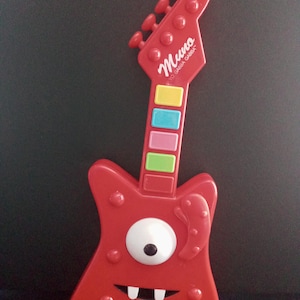 Yo Gabba Gabba! Muno's Groovin Guitar Musical Electronic Activity Play ...