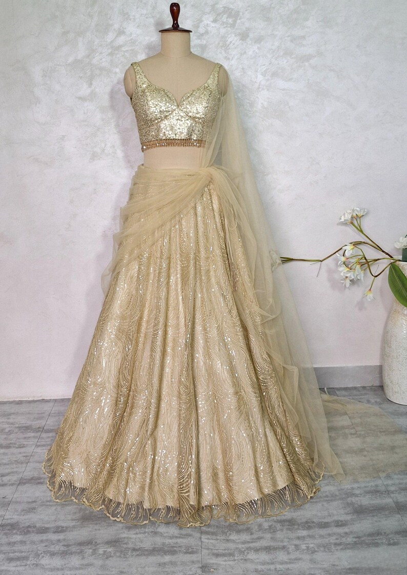 Made to Order Indian Designer Champagne Gold Embroidered Net Lehenga ...