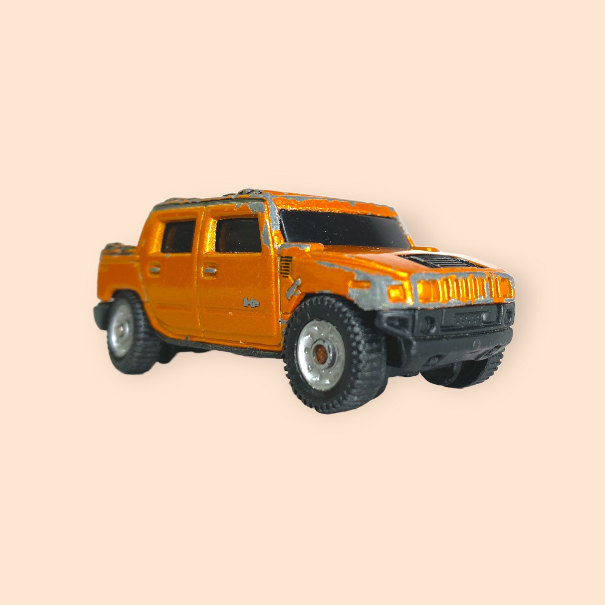 Orange Hummer H2 Truck