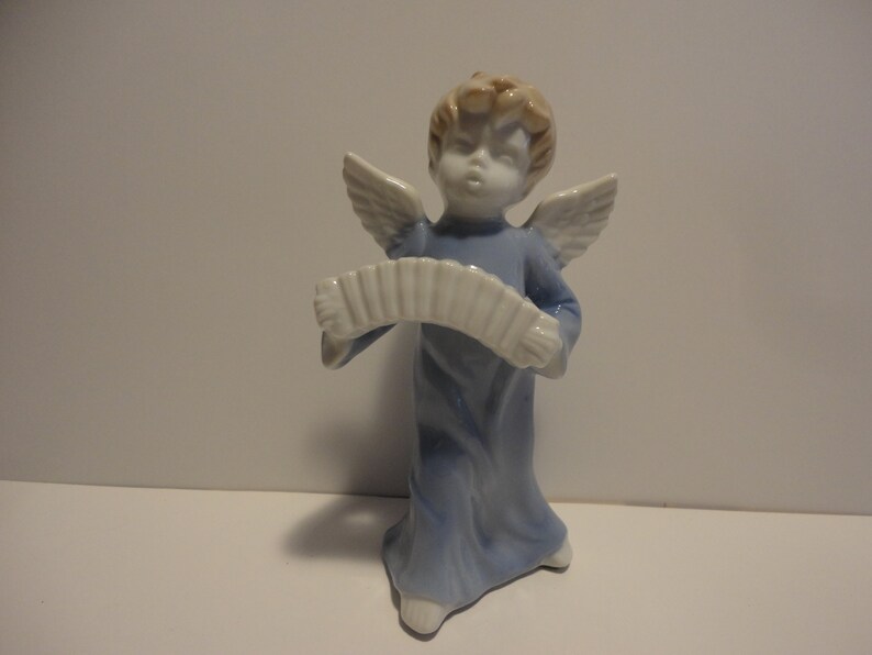 Trio of Blue and White Angels Playing Instruments Made in Japan ...